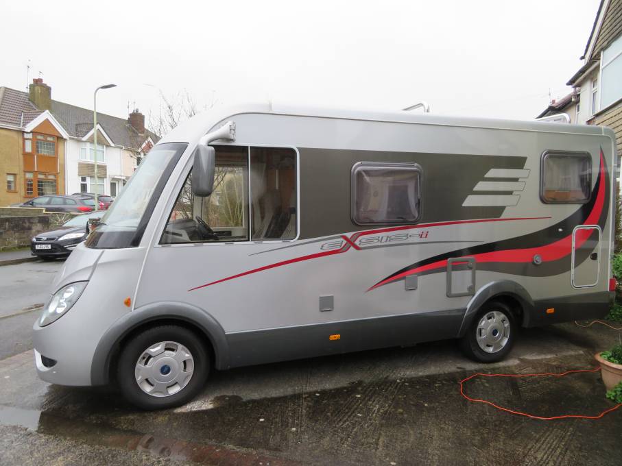 hymer exsis-i 522, 3 berth, 4 seatbelts, fixed rear bed.