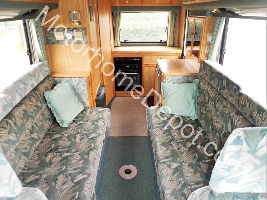 Auto Sleeper Executive Over-cab bed, Centre dinette, End kitchen