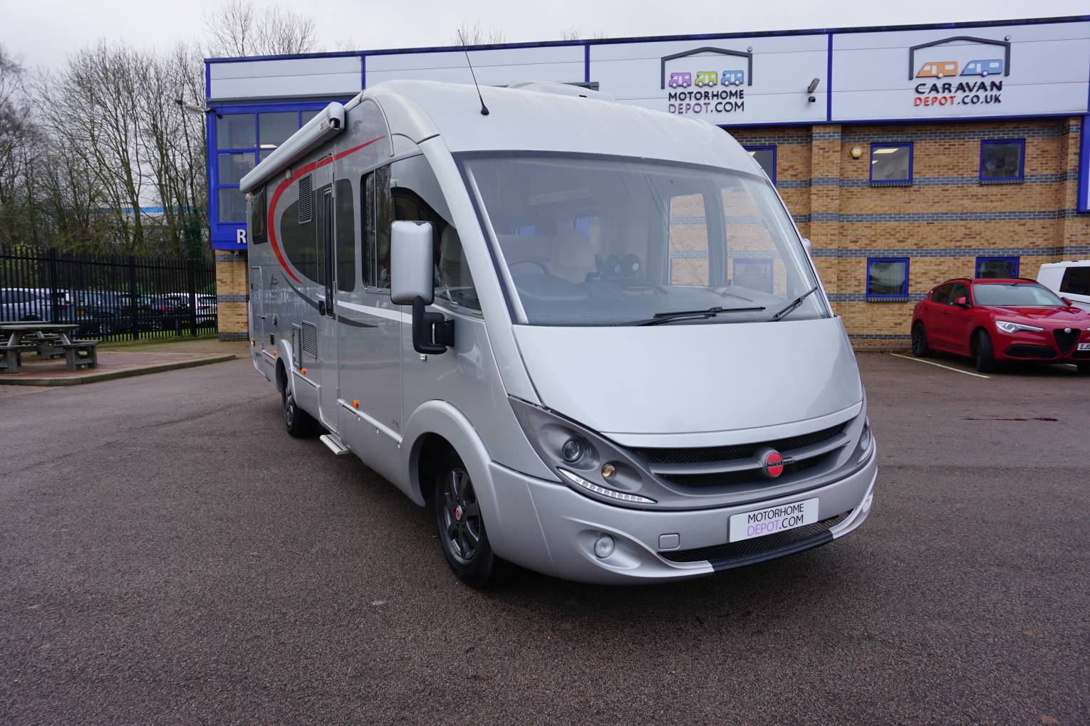 Burstner Aviano i728 4 berth 4 belts twin rear beds above garage drop down front double bed